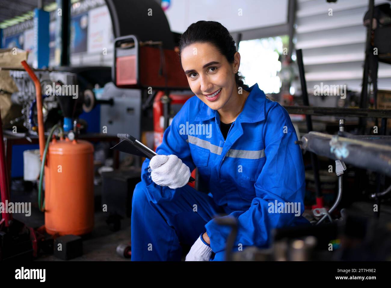 Mechanic work at auto repair shop. Small business and engineering ...
