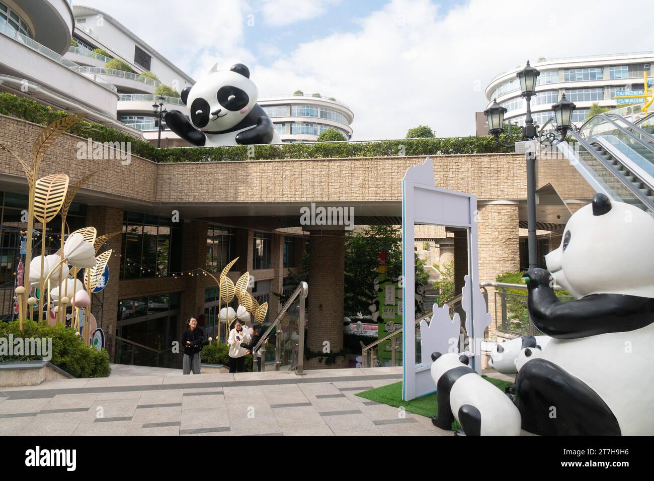 Giant panda sculptures in a shopping mall draw people, Shanghai, China ...