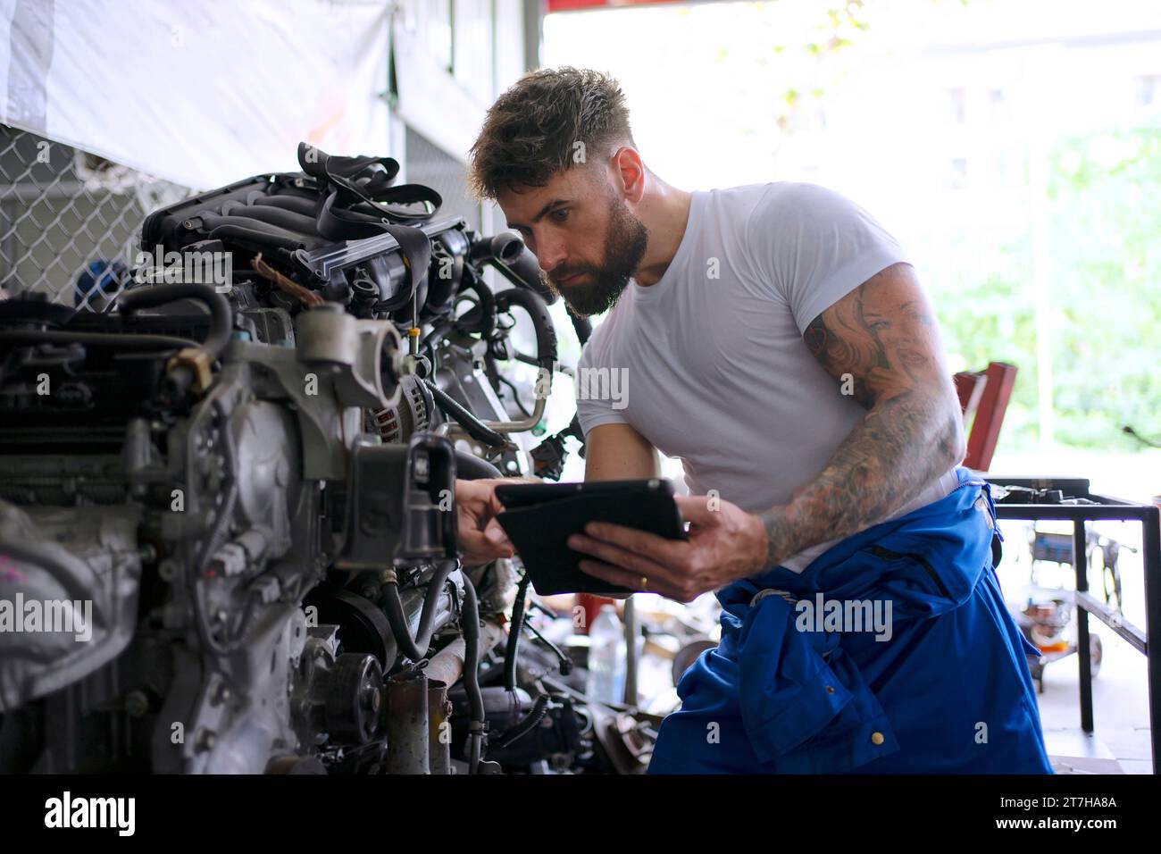 Mechanic work at auto repair shop. Small business and engineering ...