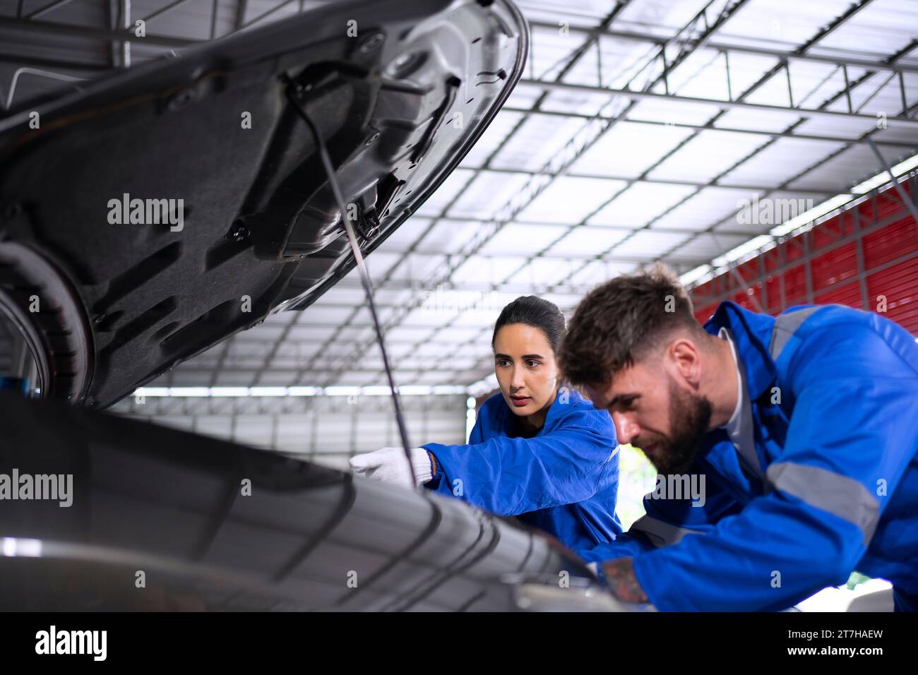 Mechanic work at auto repair shop. Small business and engineering ...