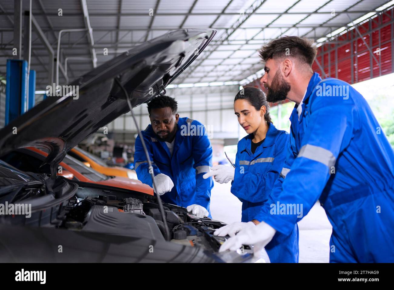 Mechanic work at auto repair shop. Small business and engineering ...
