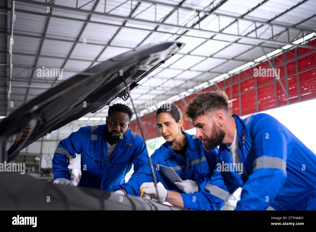 Mechanic work at auto repair shop. Small business and engineering ...