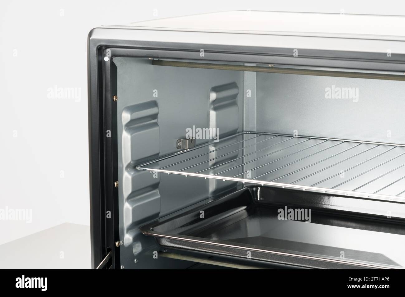 Inside of empty mini electric stove oven Stock Photo - Alamy