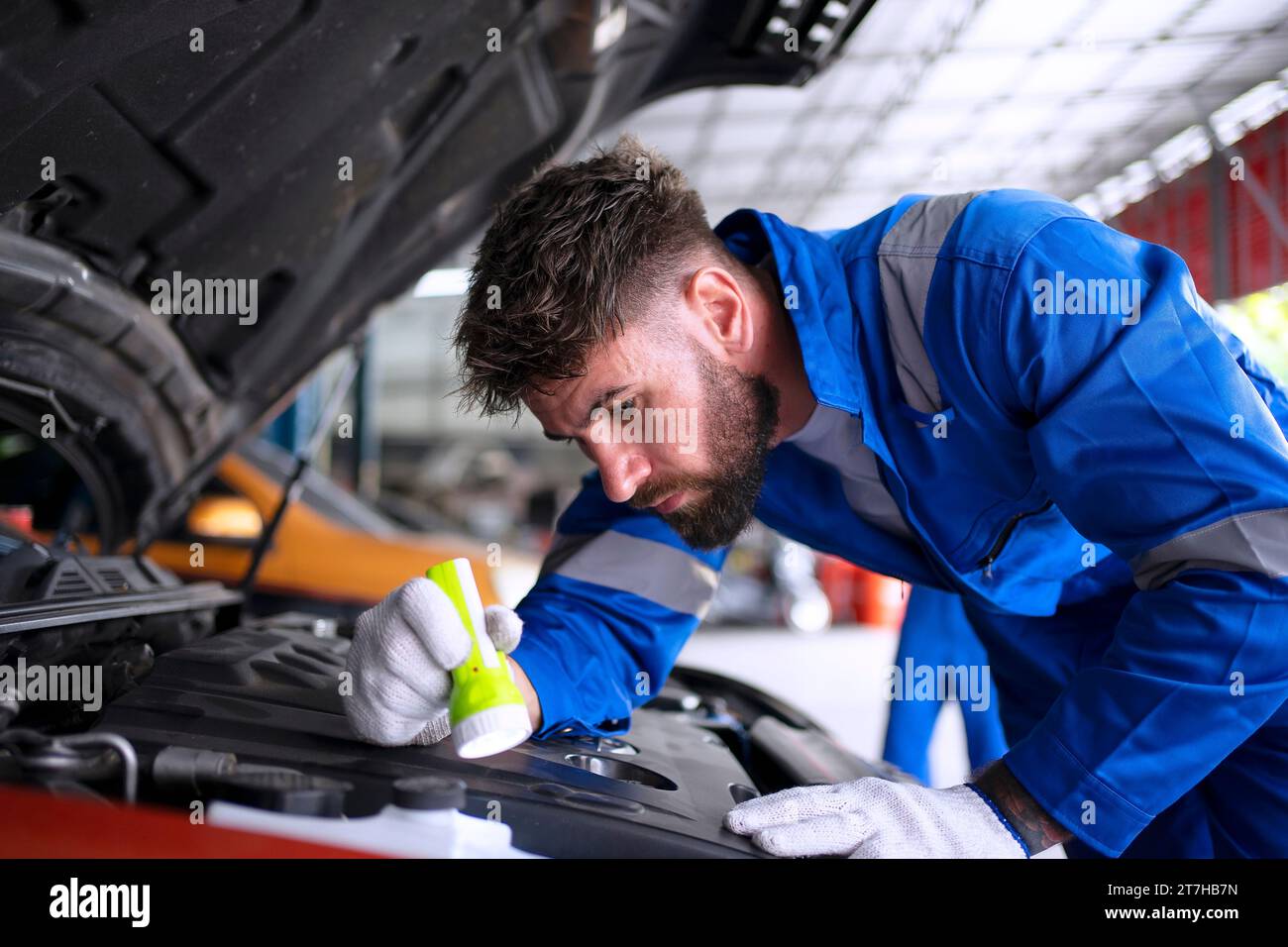 Mechanic work at auto repair shop. Small business and engineering ...