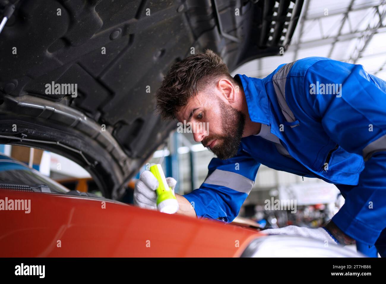 Mechanic work at auto repair shop. Small business and engineering ...