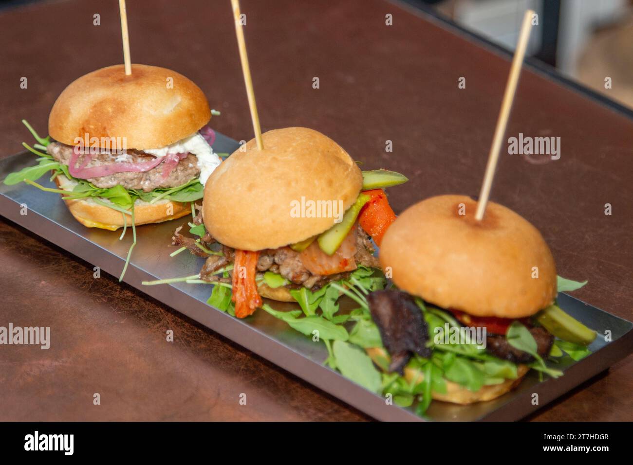 Burger trio hi-res stock photography and images - Alamy