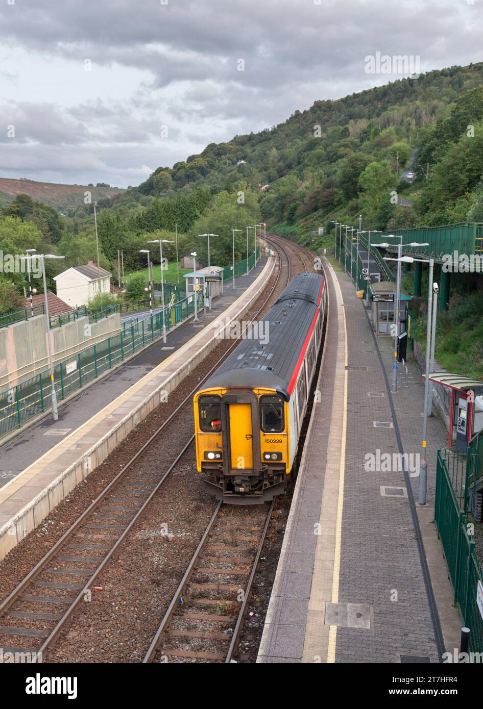Transport For Wales class 150 DMU train 150229 calling at Tir-Phil railway station South Wales ...