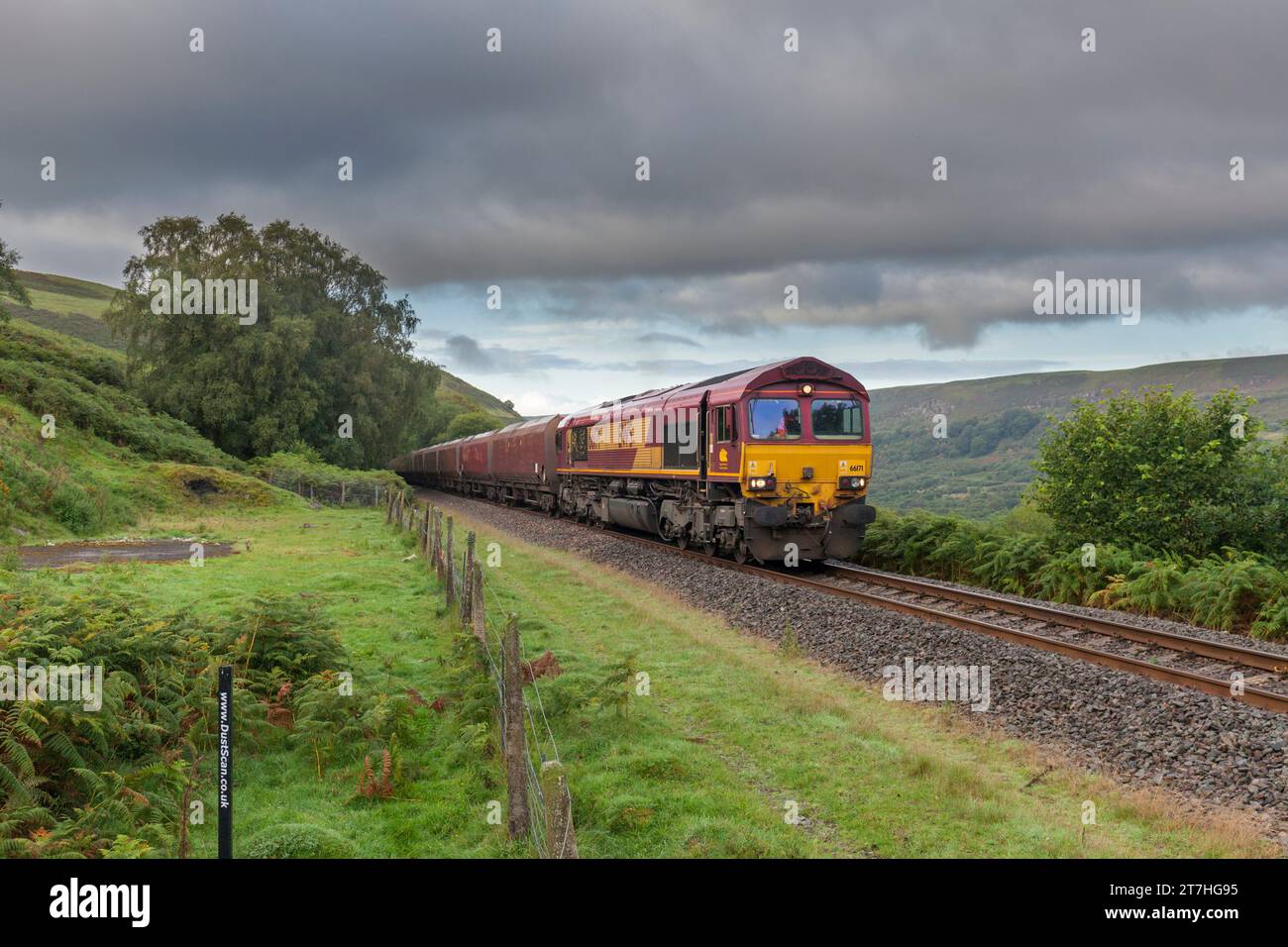 DB Cargo rail UK class 66 locomotive hauling an empty coal train at ...