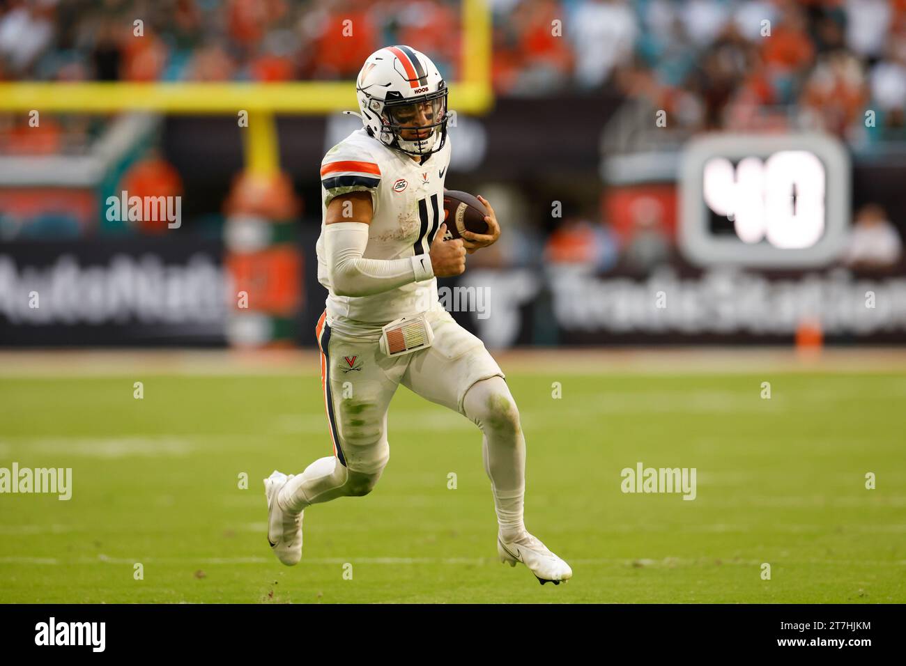 University of Virginia quarterback Tony Muskett (11) carries the ball ...