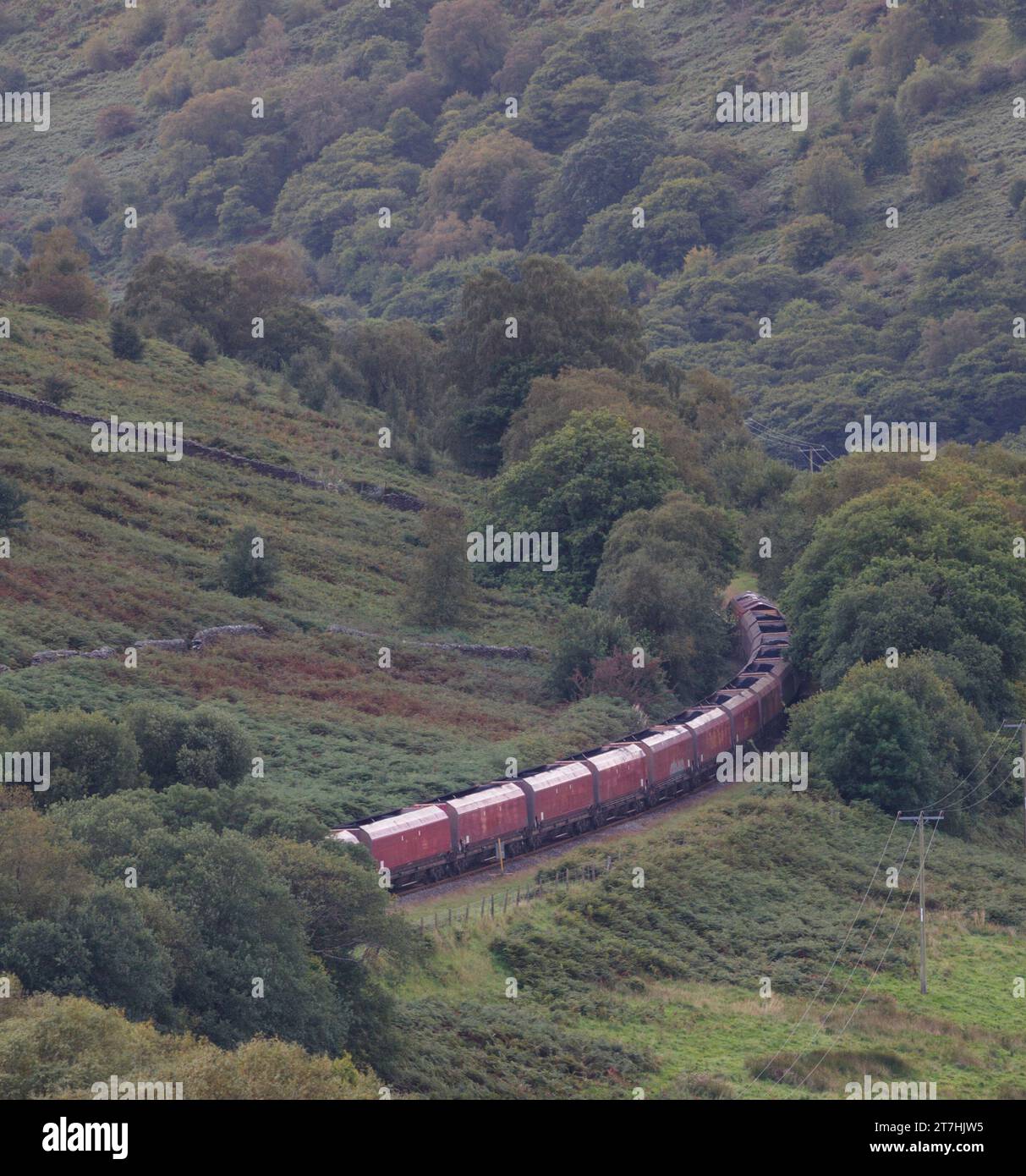 DB Cargo class 66 locomotive heading down the Taff Bargoed Valley ...