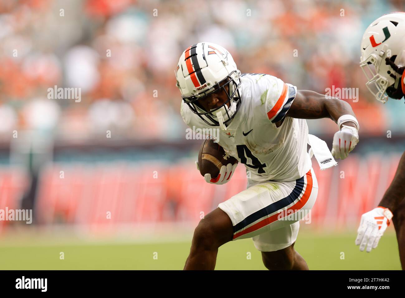 University of Virginia running back Malik Washington (4) carries the ...
