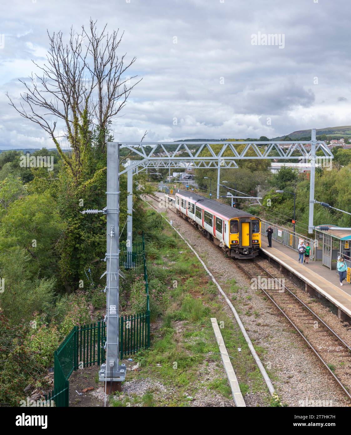 Transport For Wales class 150 DMU train 150278 calling at Cwmbach railway station, South Wales ...