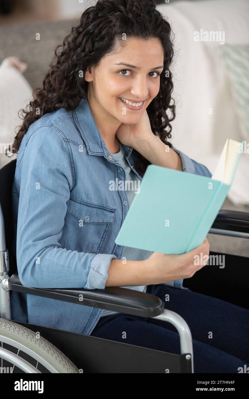 Disabled girl in wheelchair taking hi-res stock photography and images ...