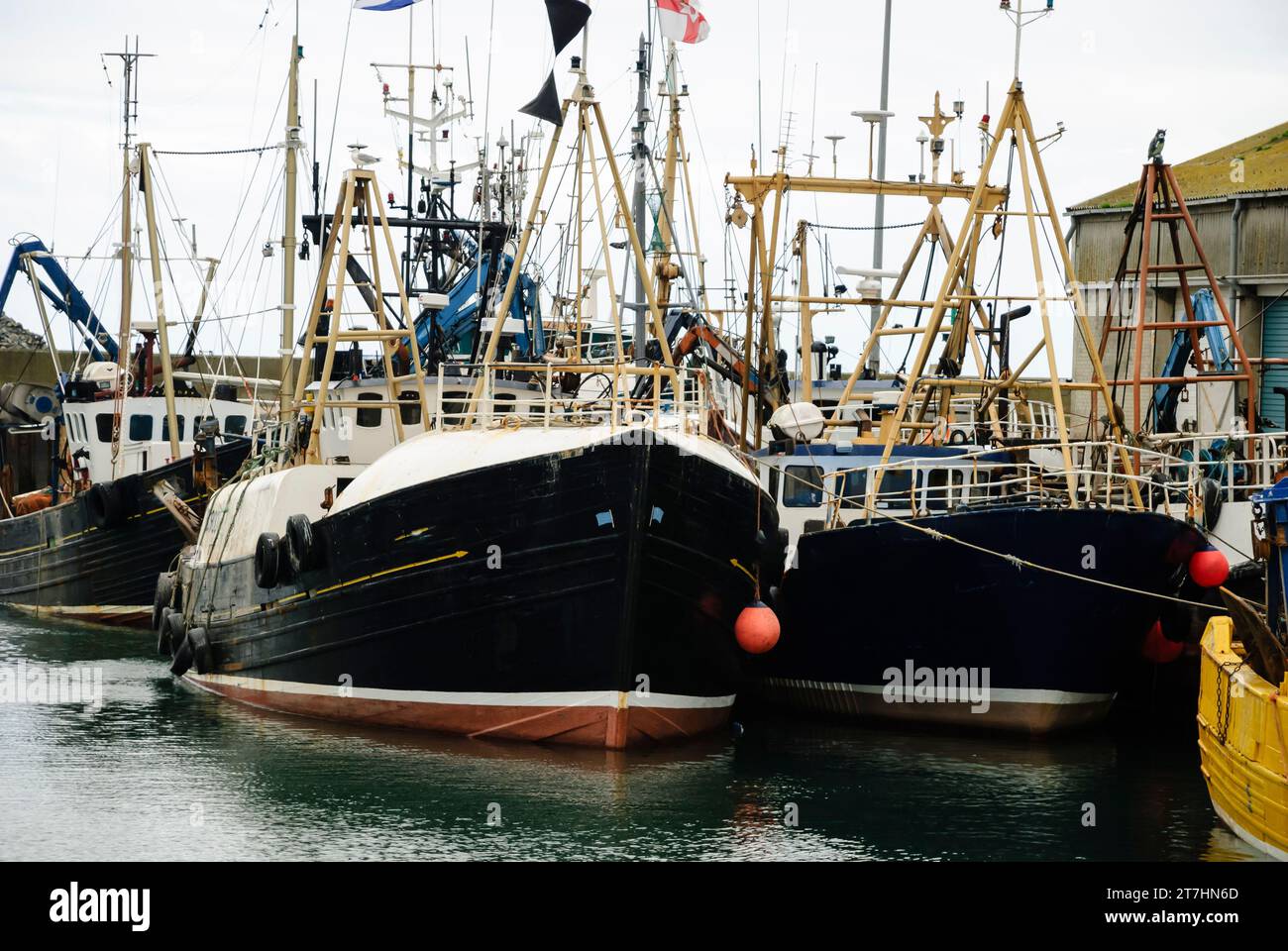 A number of trawlers at a harbour Stock Photo - Alamy