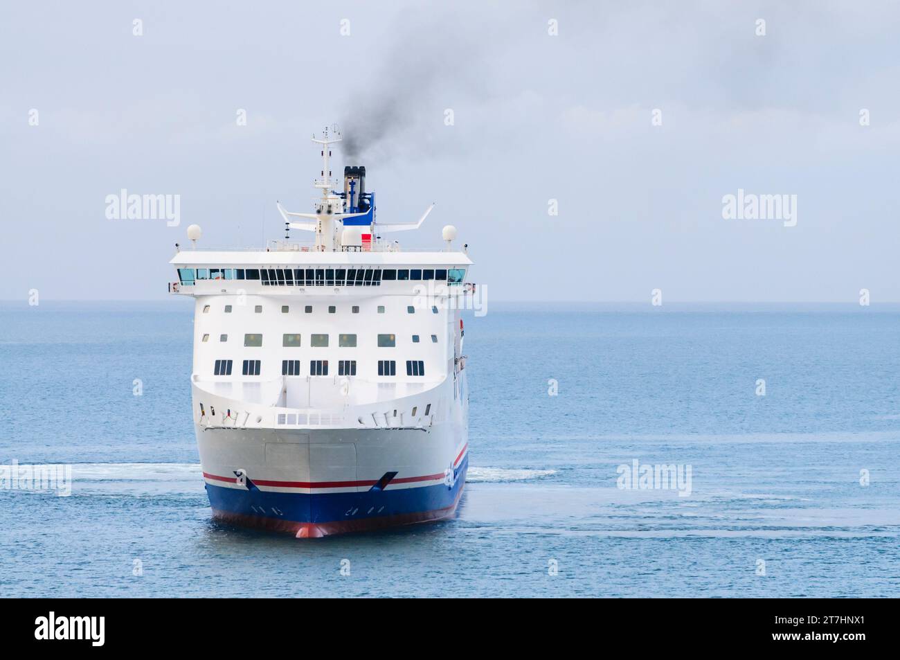 Passenger and vehicle ferry sailing on its route on the sea Stock Photo ...