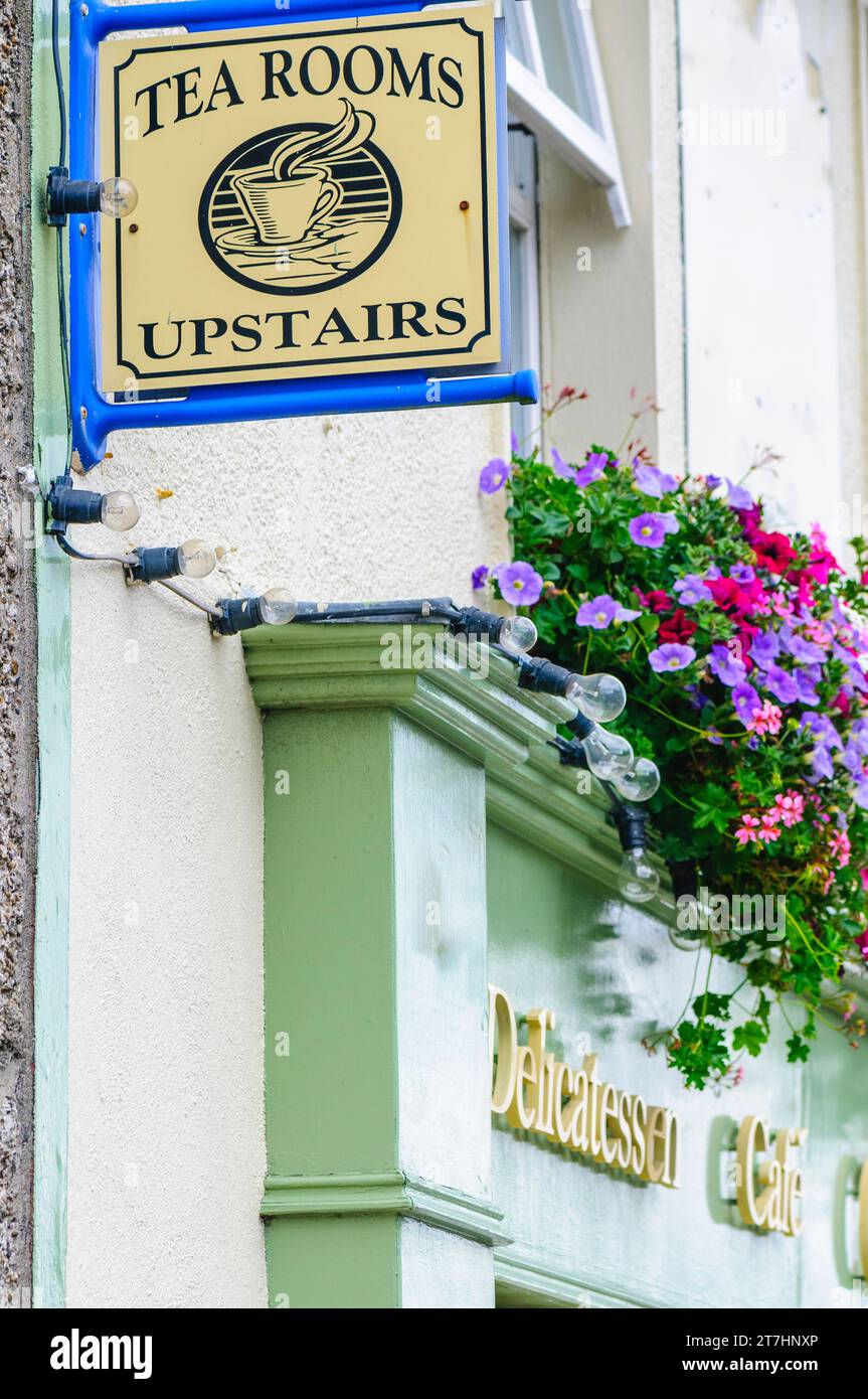 Sign at a cafe indicating that tea rooms are available upstairs Stock ...