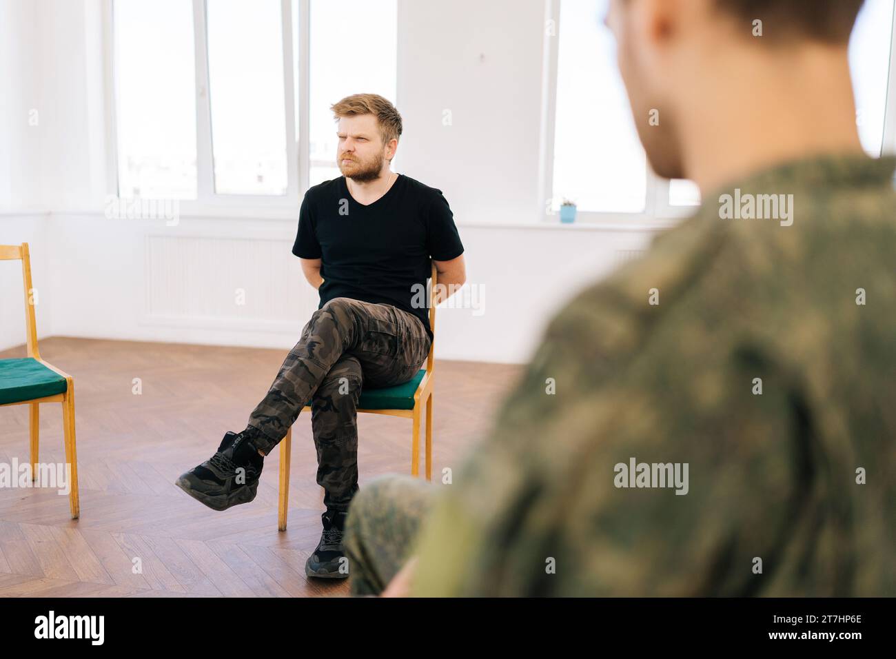 View from shoulder of unrecognizable soldier man speaking about ...