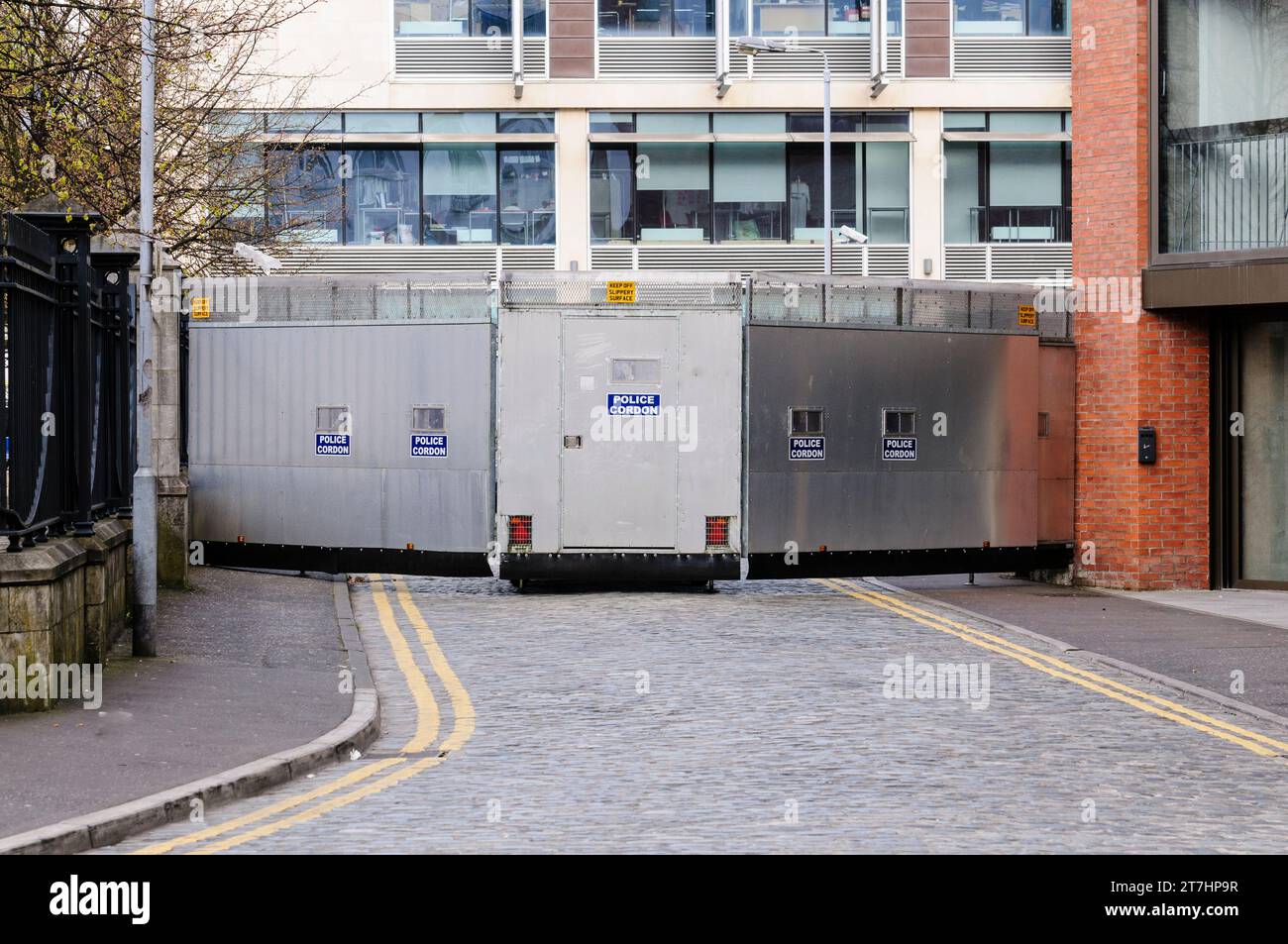 A metal mobile Police Cordon barrier blocks off a street in Belfast ...