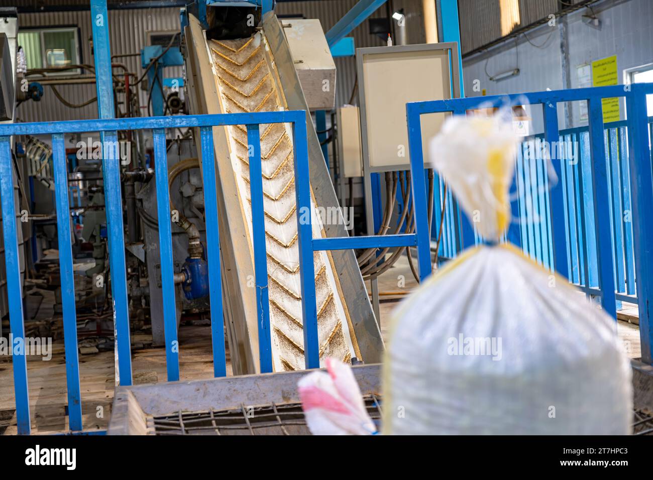 olive sacks in front of pressing conveyor for olive oil industry Stock ...