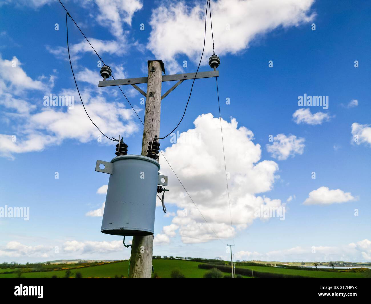 15kVA transformer mounted on a wooden pole in a rural setting Stock ...