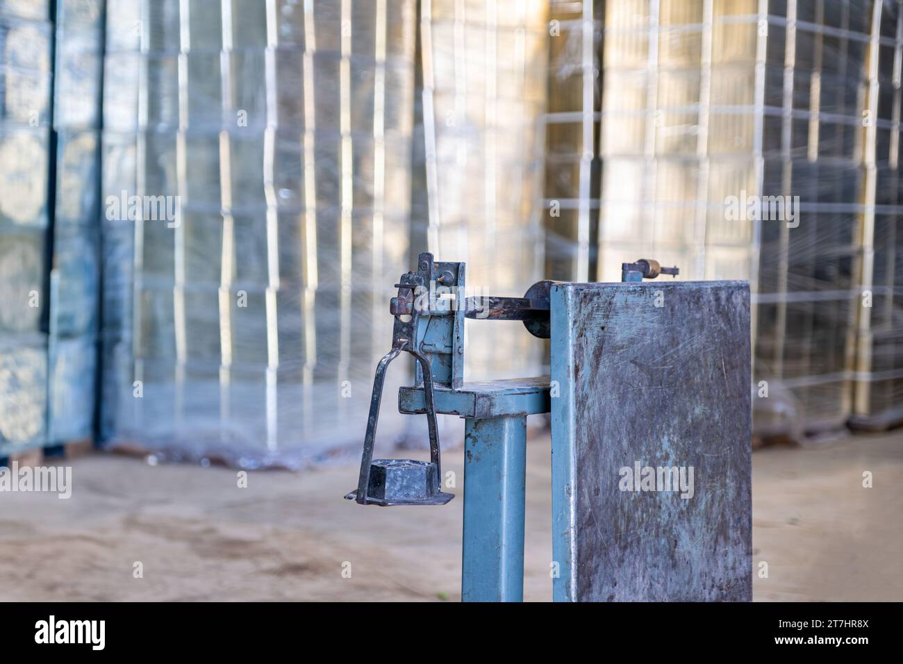 weighing Scale in front of tin used to fill olive oil and all type of ...