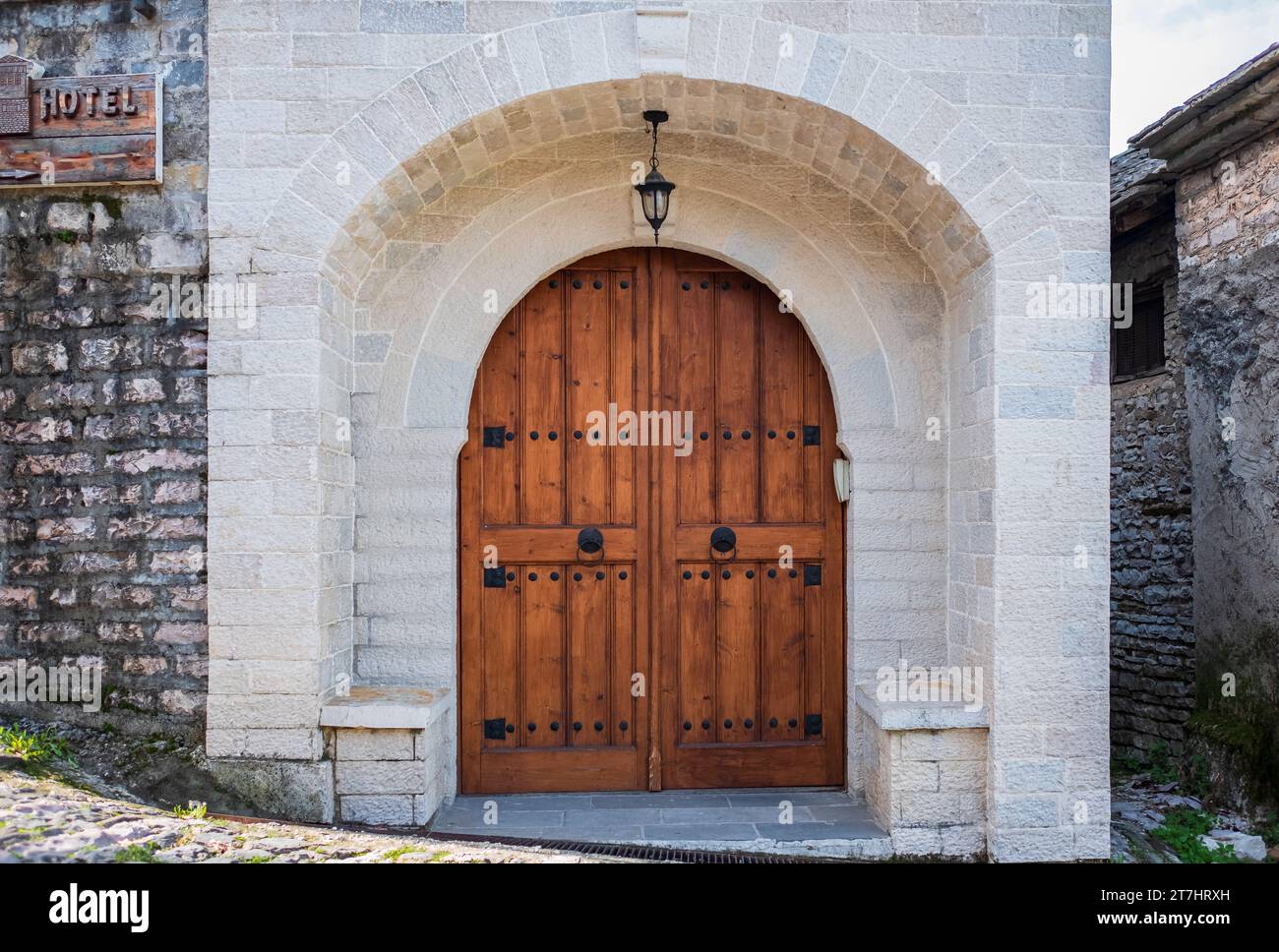 Traditional european facade with entrance door. Entrance of house with ...