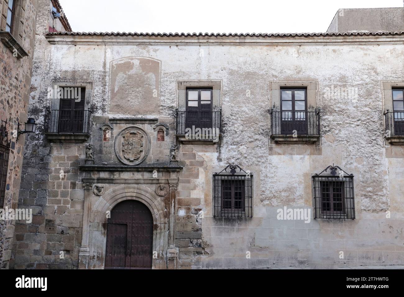 Caceres, Extremadura, Spain- October 23, 2023: The Ovando Palace facade ...