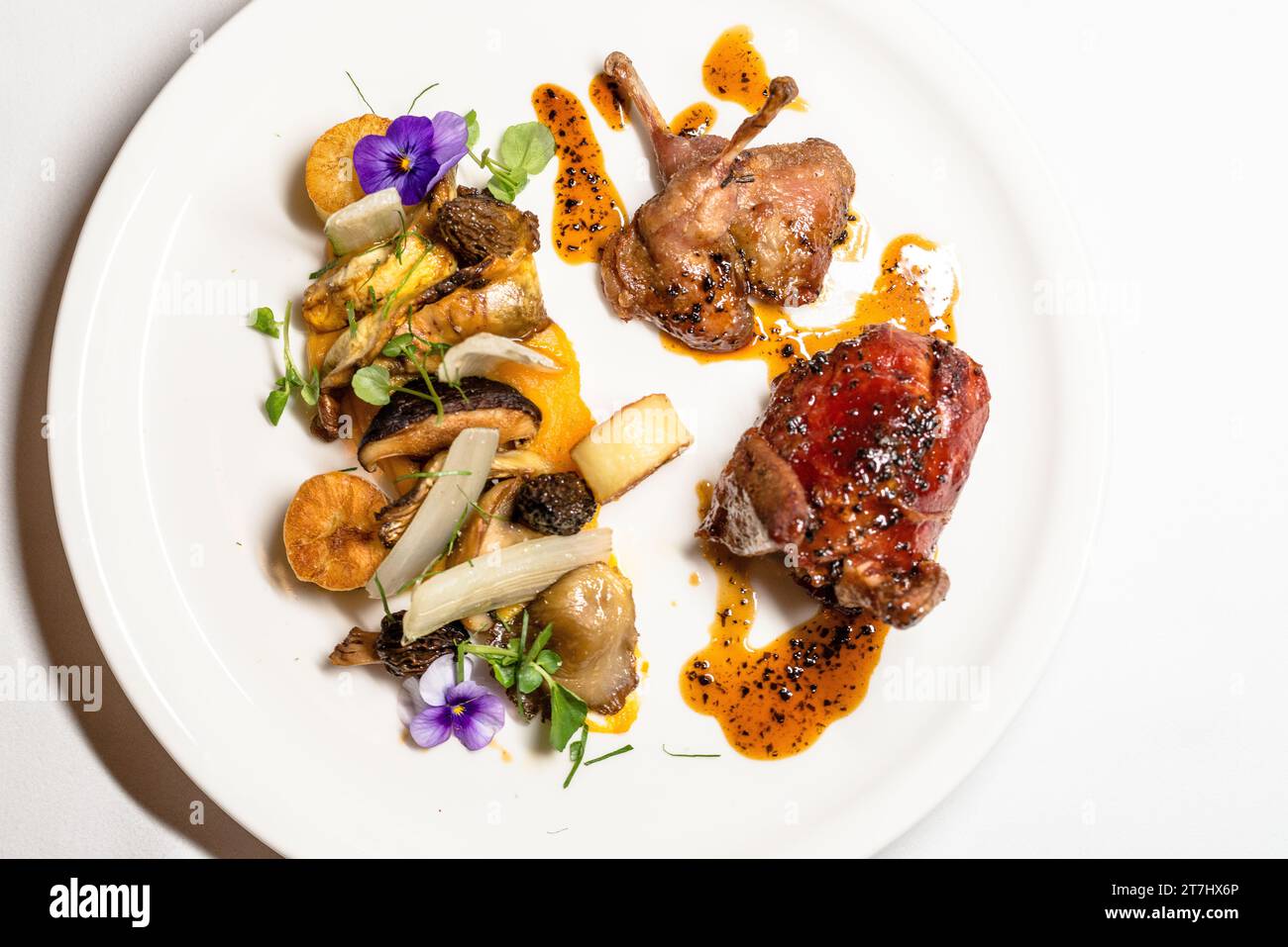 A plate of freshly prepared food, including mushrooms, meat, and ...