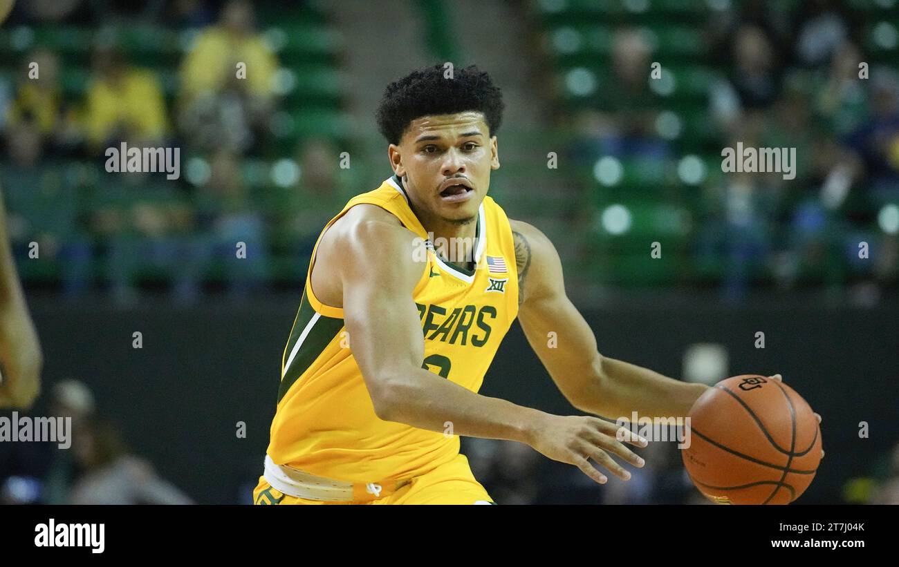 Baylor's RayJ Dennis drives against UMKC during the first half of an ...