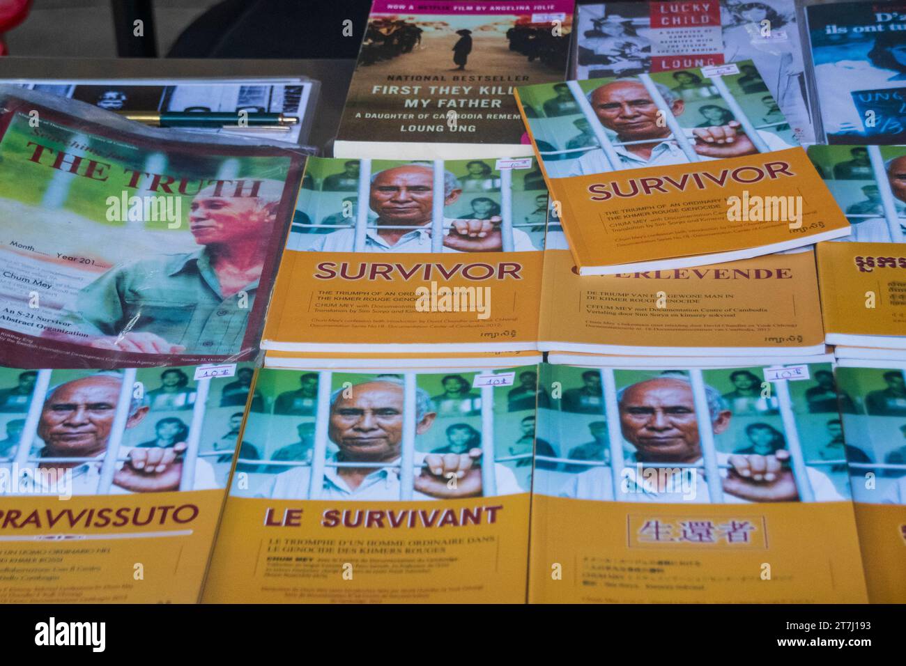 Chum Mey and his book in the courtyard of tuol sleng prison in phnom ...