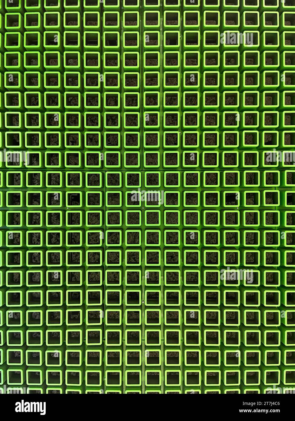 A modern green wallpaper featuring an intricate grid pattern Stock ...