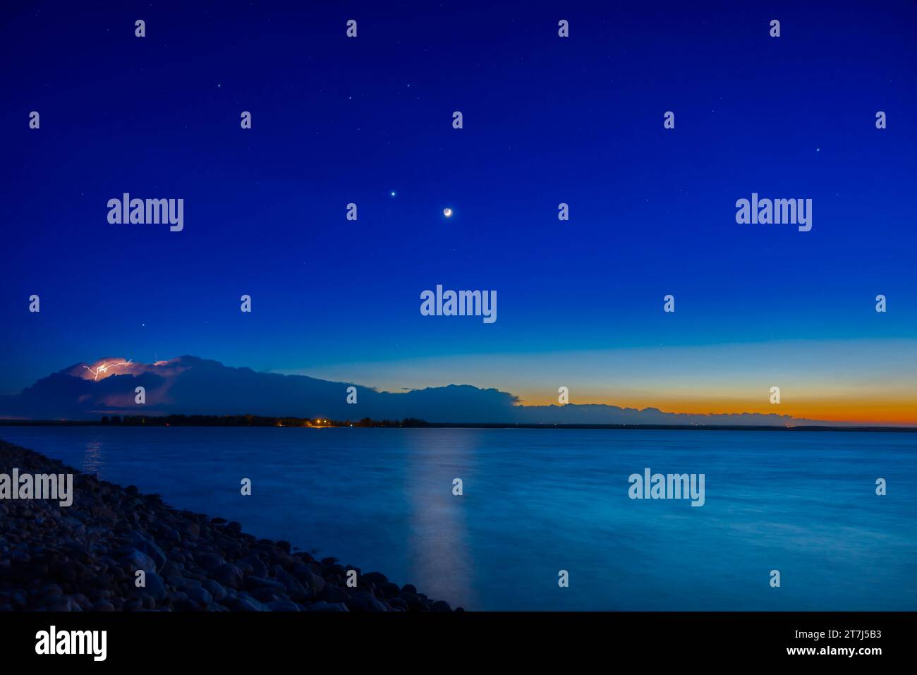 A scene of the crescent Moon with Earthshine, planets and the last of ...