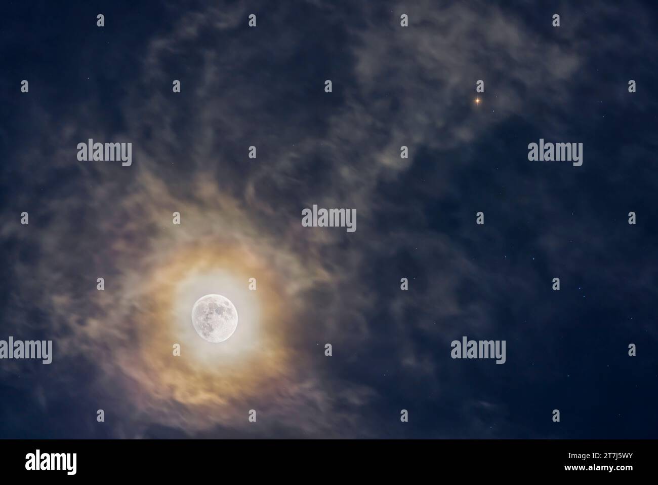 This is the waxing gibbous Moon (11.7 days old) near reddish Mars (at ...