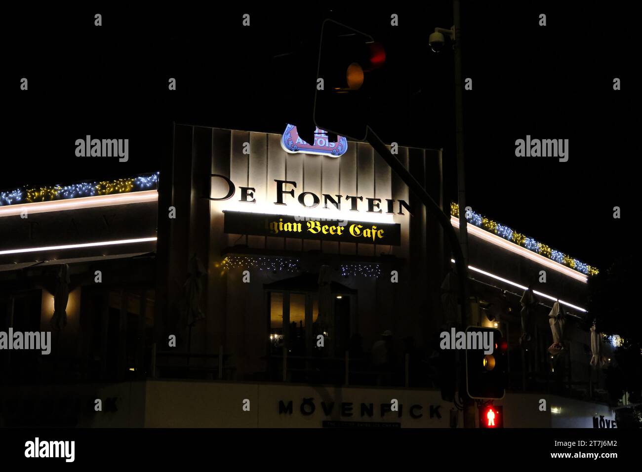 The illuminated sign of De Fontein Belgian Beer Cafe in Auckland Stock ...