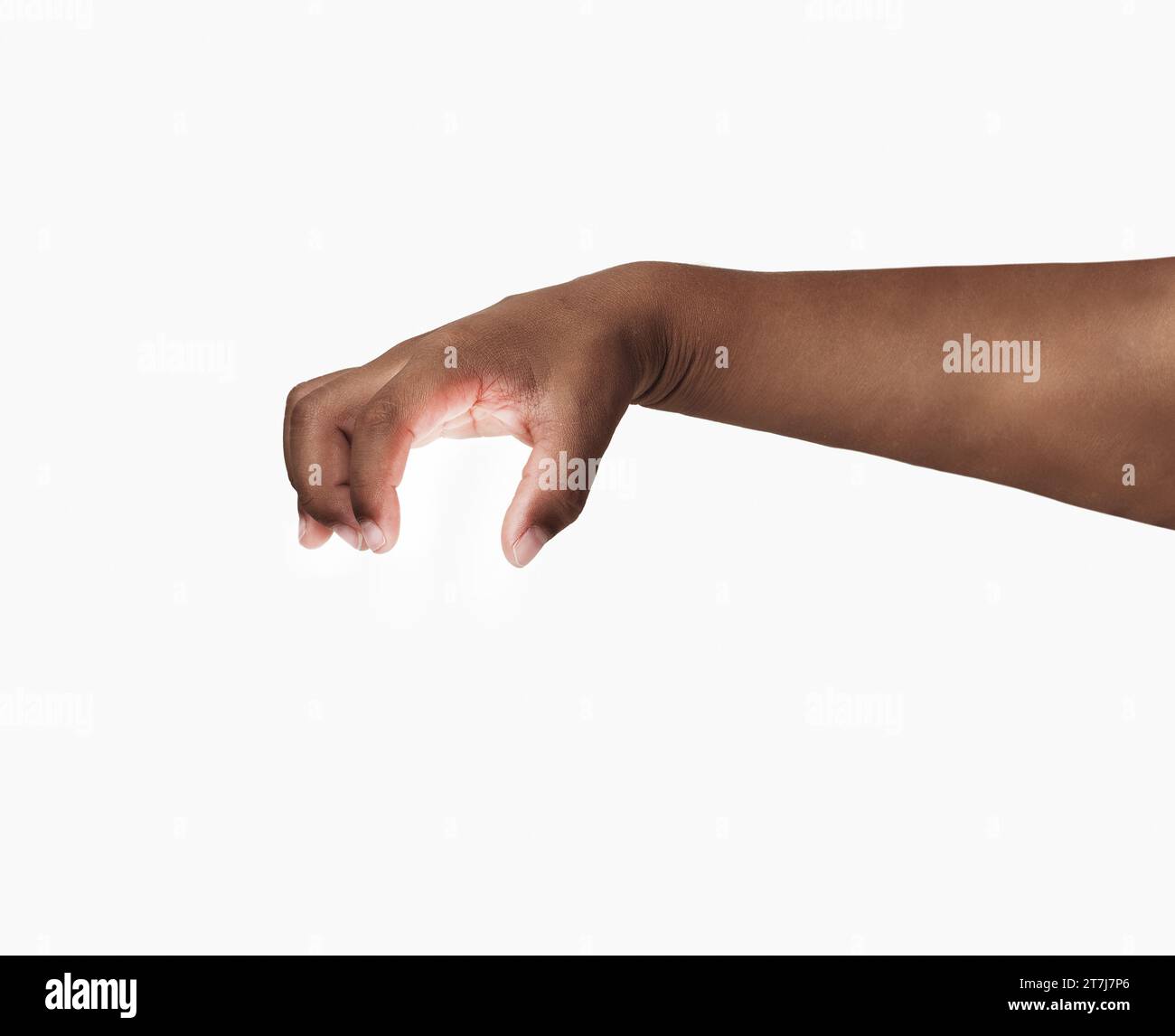 African child hand with gesture of catching down against a white ...