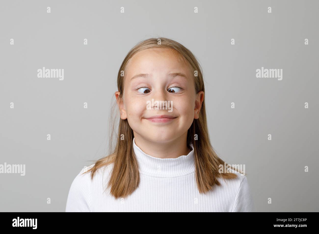 Funny kid face. Adorable girl grimacing, portrait Stock Photo - Alamy