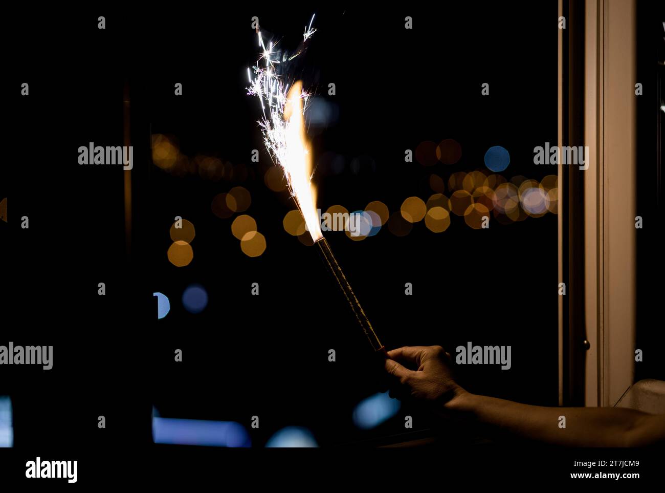 Hand held fireworks burning abstract background Stock Photo - Alamy