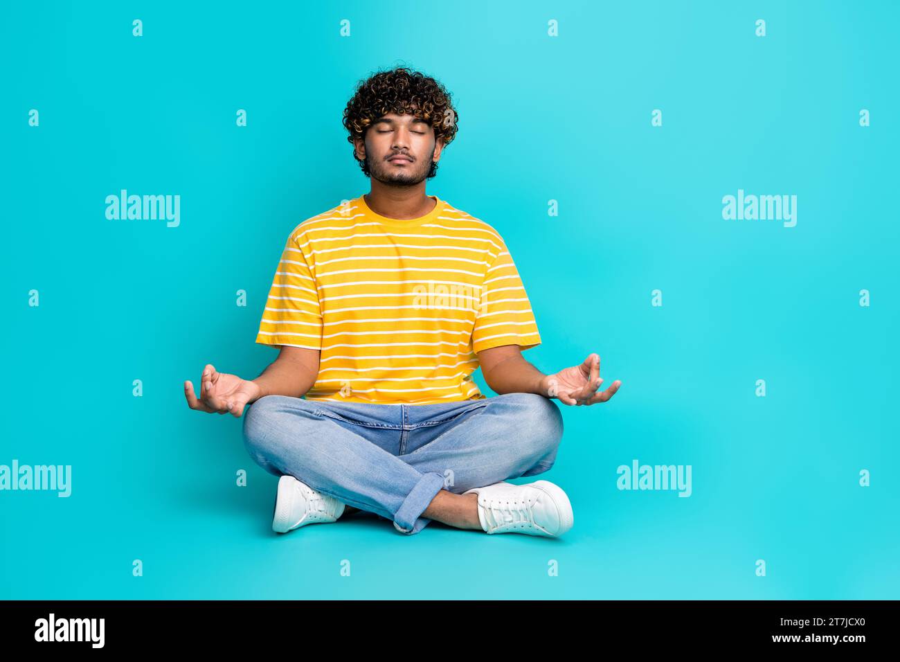 Full length portrait of calm person sit floor crossed legs meditate ...