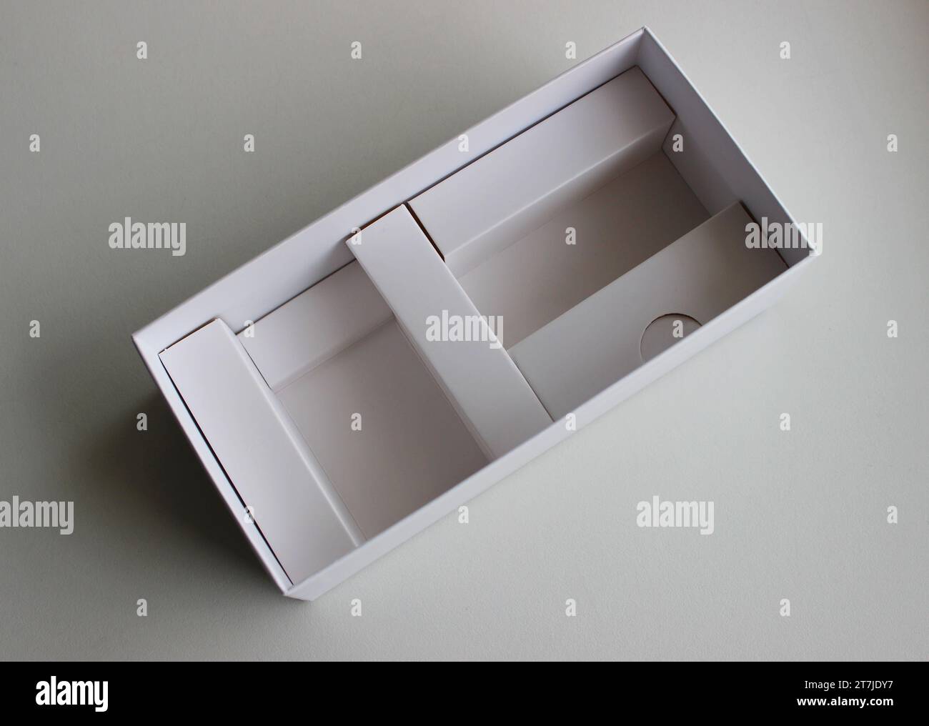 Cardboard box with compartments and dividers on white studio isolated ...
