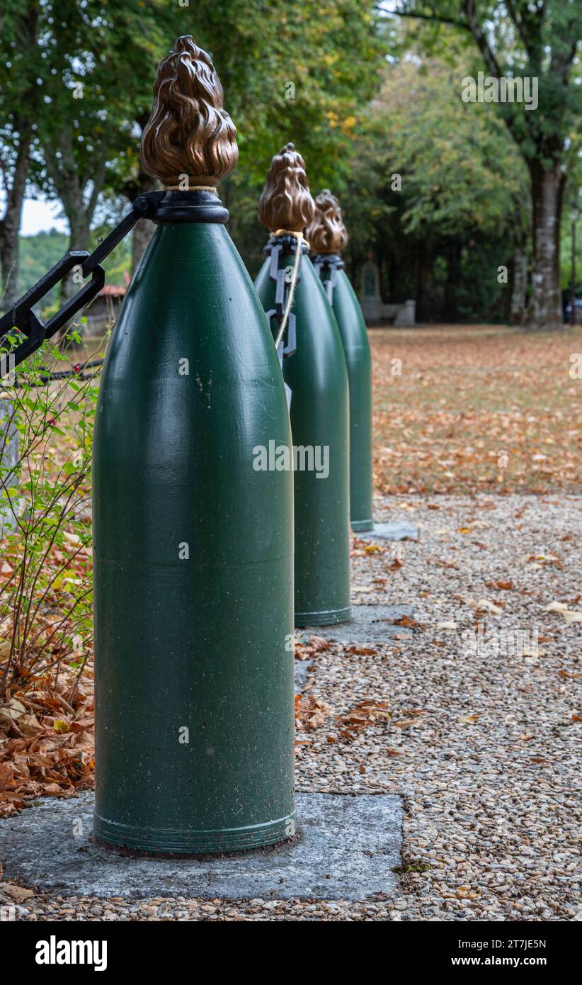 A trio of WW2 shells incorporated into a war memorial in the Perigord ...