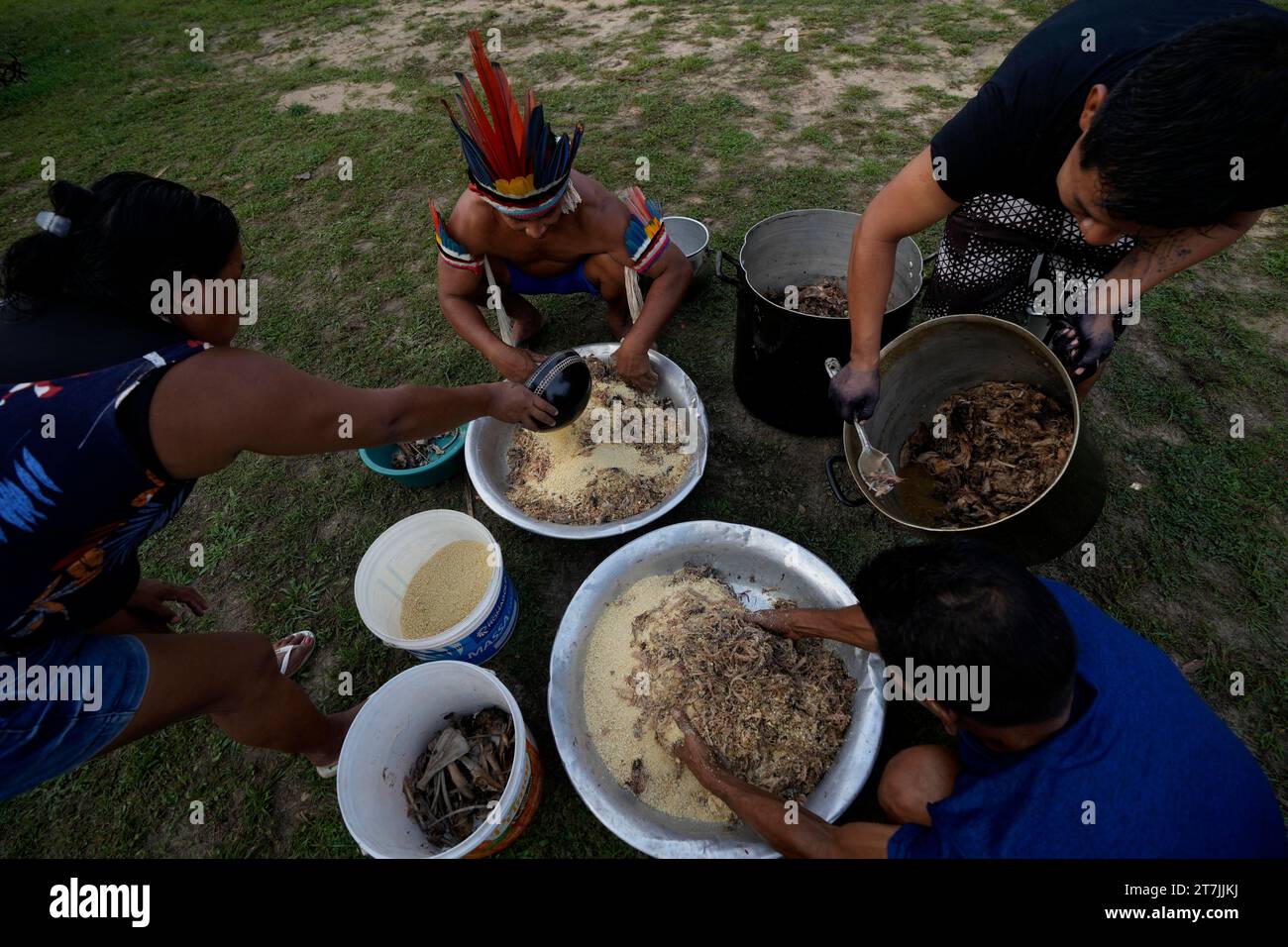 Indigenous Tembe prepare food for their community in the Tenetehar Wa ...