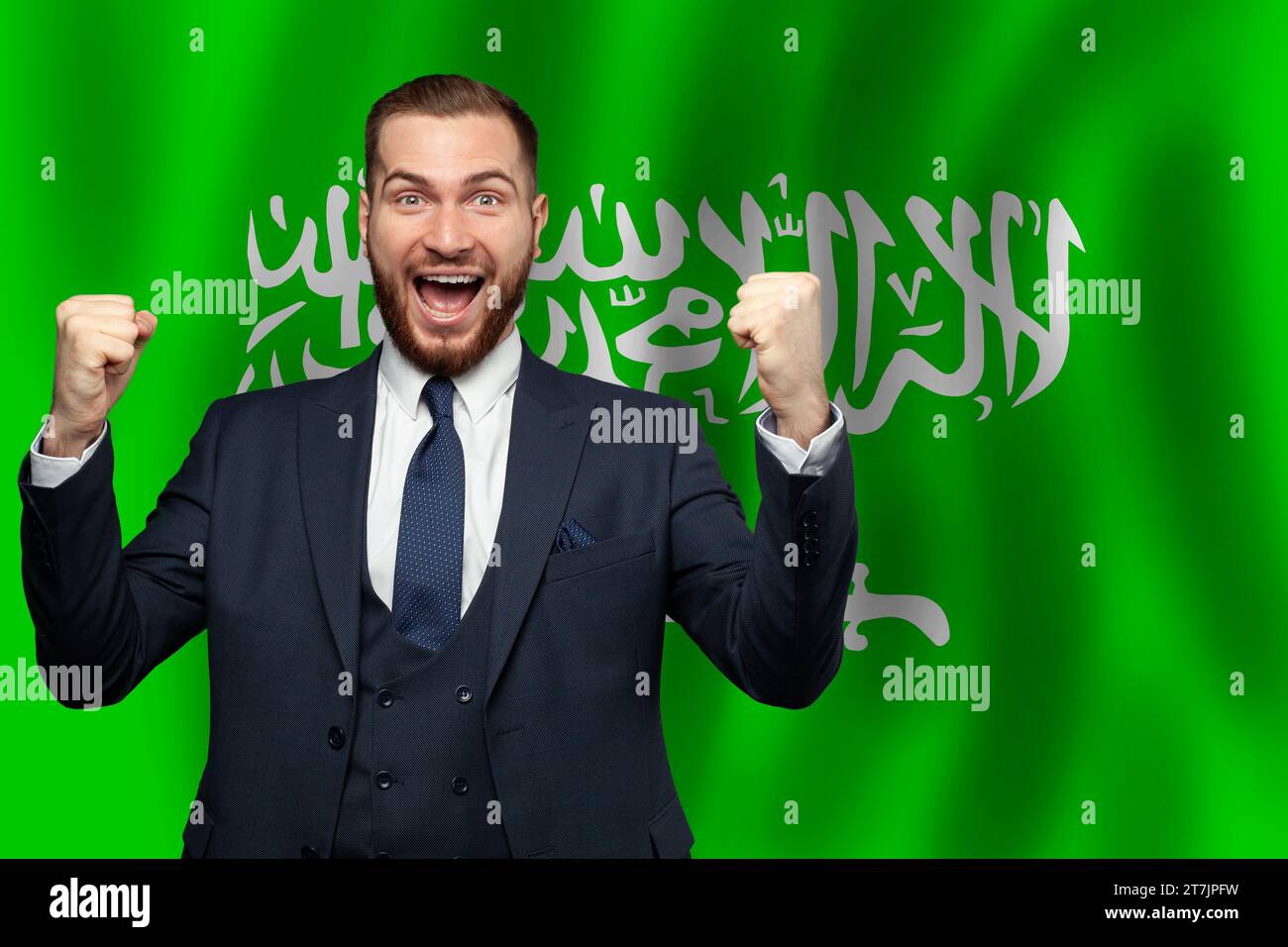 Saudi Arabian happy businessman on the background of flag of Saudi ...