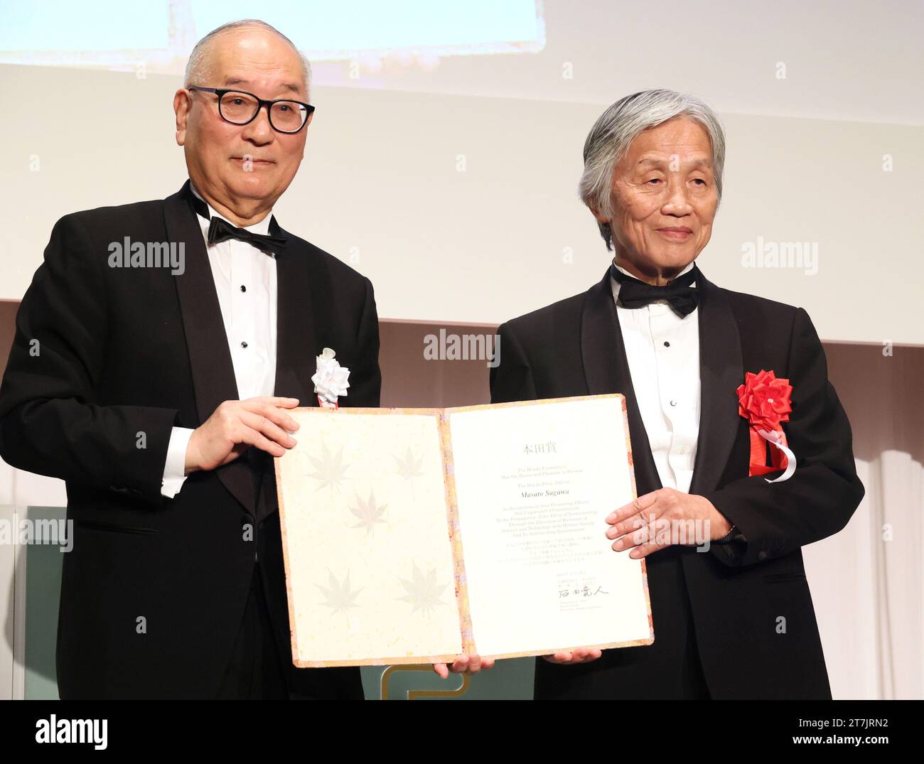 Tokyo, Japan. 16th Nov, 2023. Japanese scientist Masato Sagawa (R ...