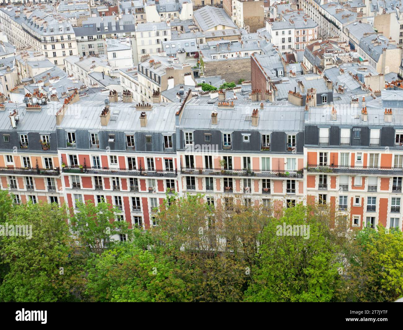 Paris, France - May 8th 2023: Panoramic view of a row of historic red ...