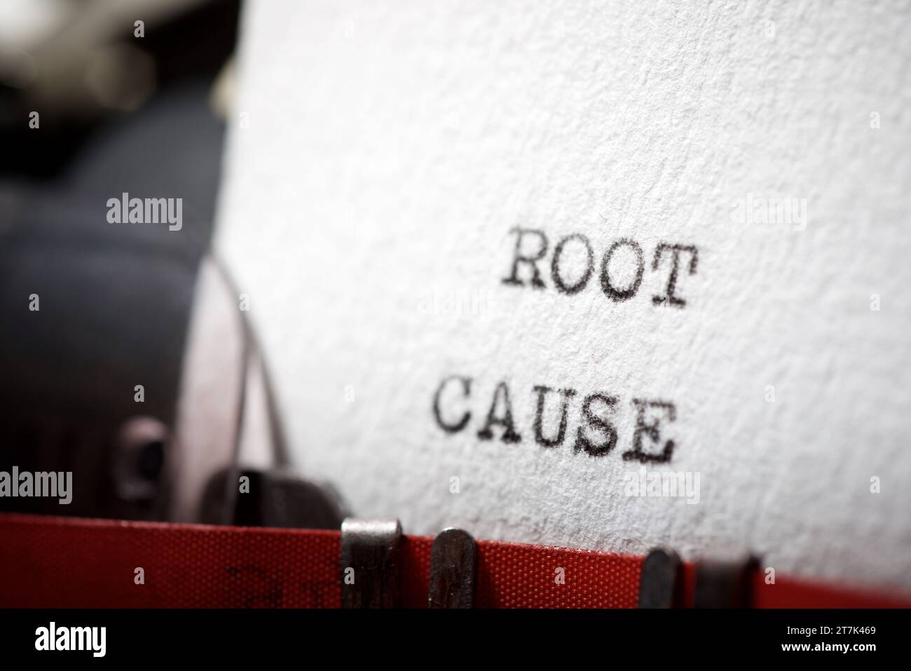 Root cause text written with a typewriter Stock Photo - Alamy