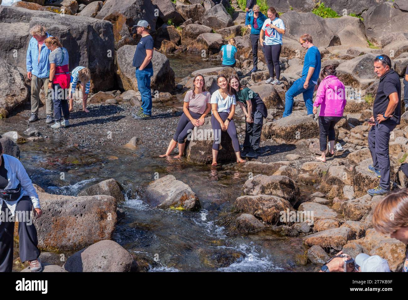 People at the Oxararfoss waterfalls in Iceland. Oxarafoss also called ...