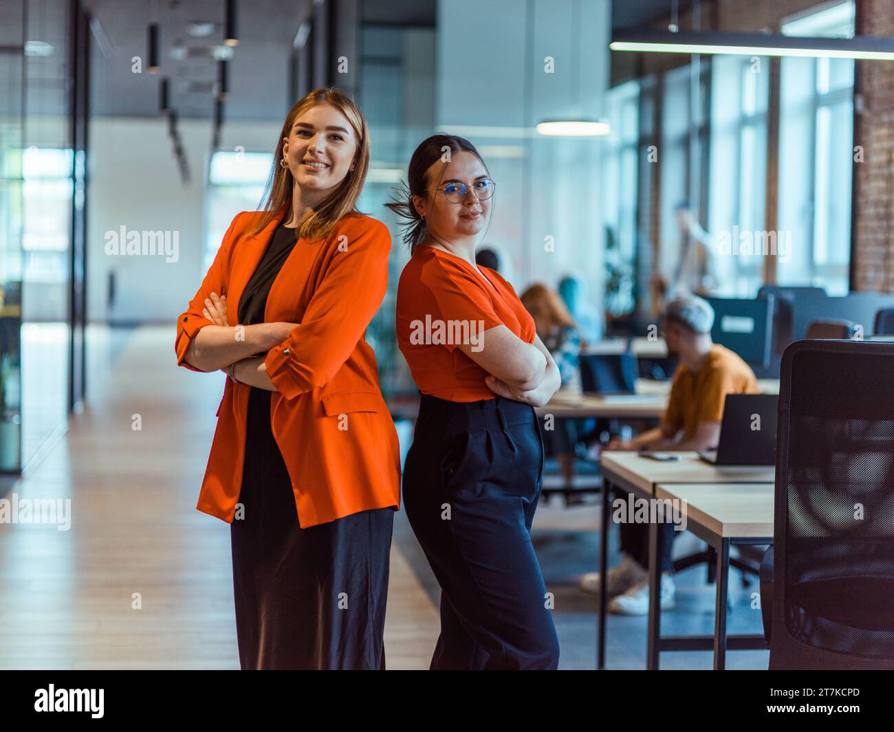 Group of determined businesswomen confidently pose side by side in a ...