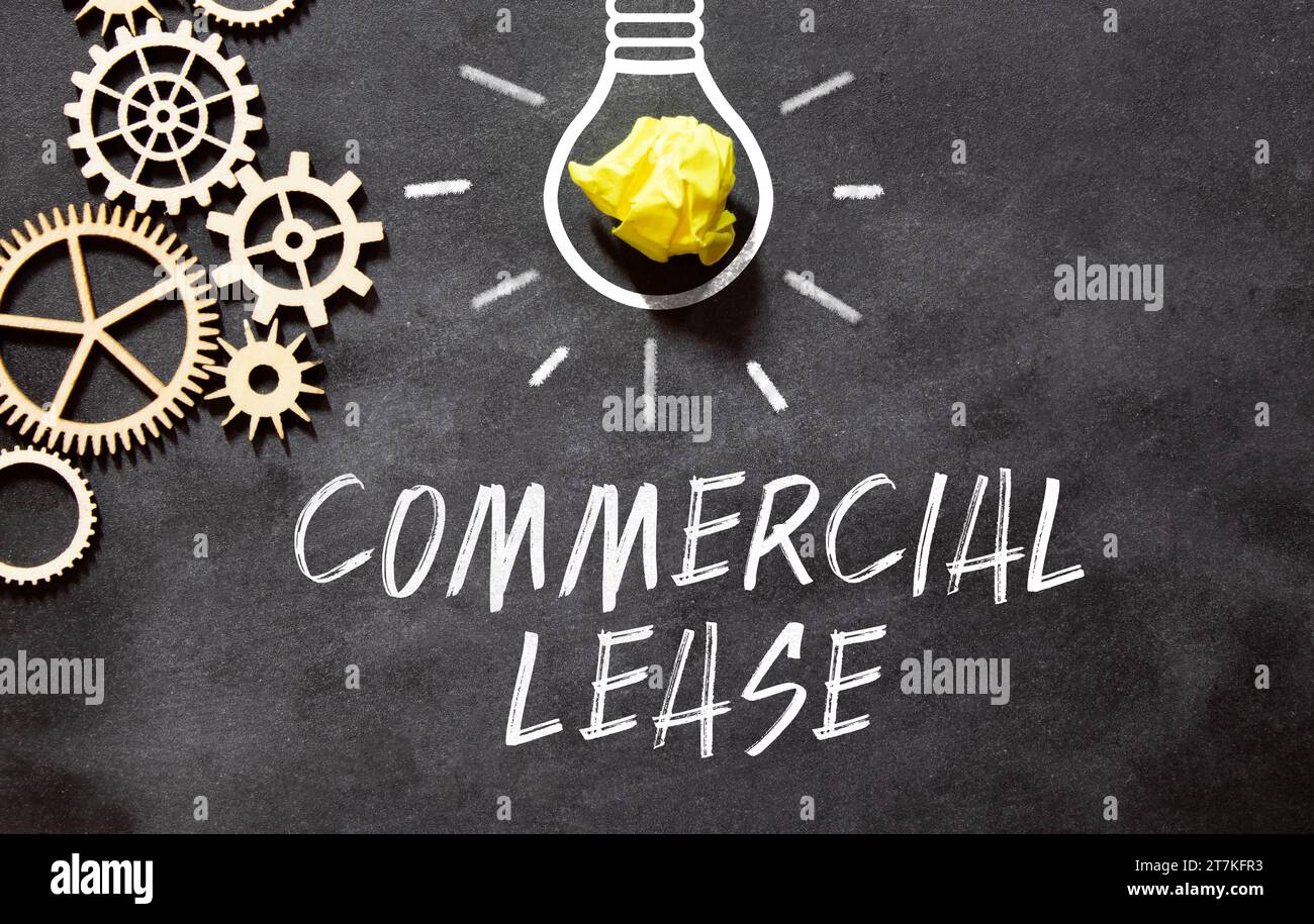 top view of a torn page on a notebook near a calculator and glasses ...