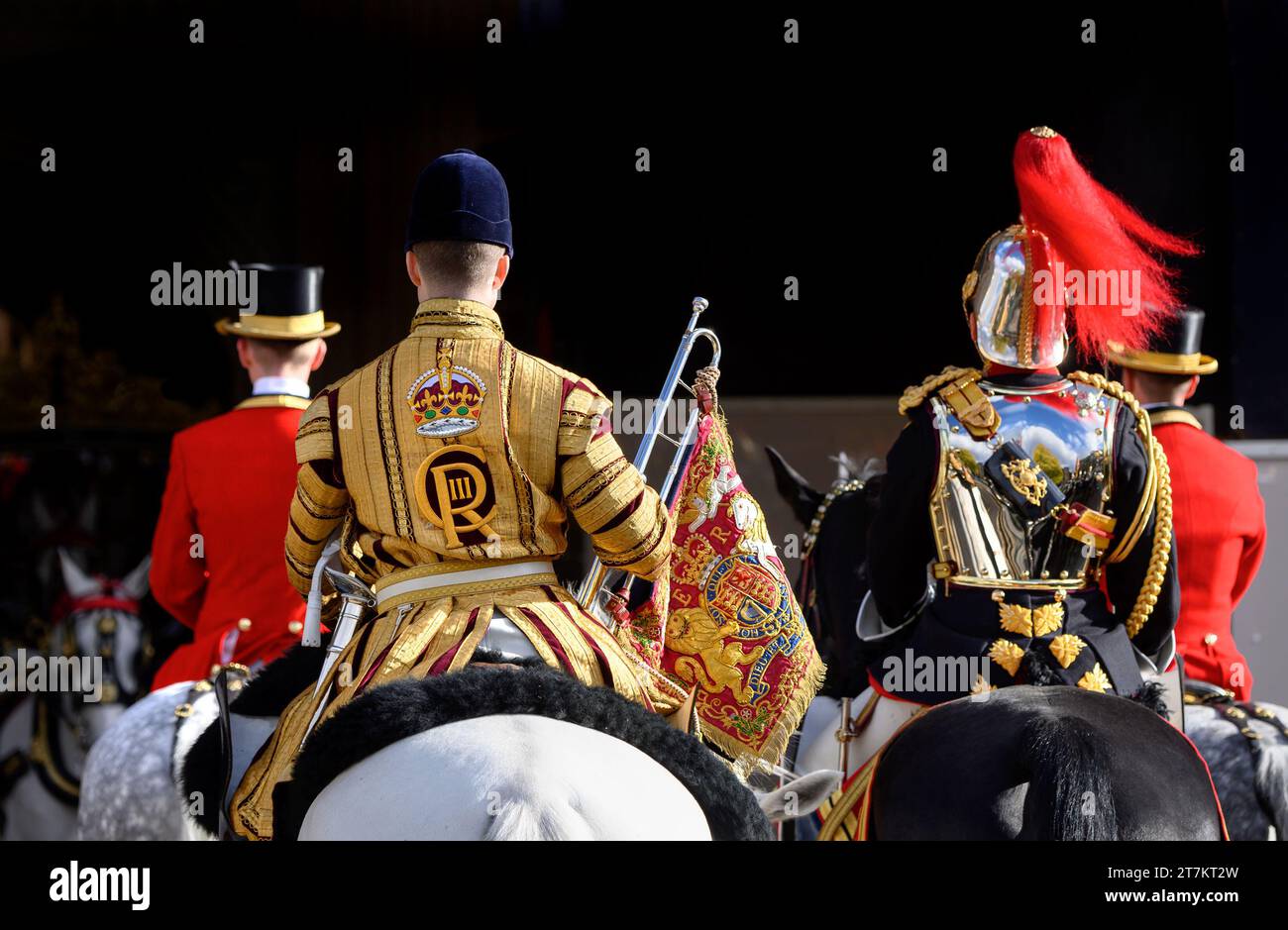 Household Cavalry mounted trumpeter in full ceremonial uniform with Charles III royal cypher at ...
