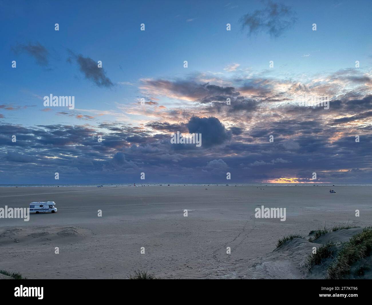 Sunset on the beach of the north sea island Romo in Denmark Stock Photo ...